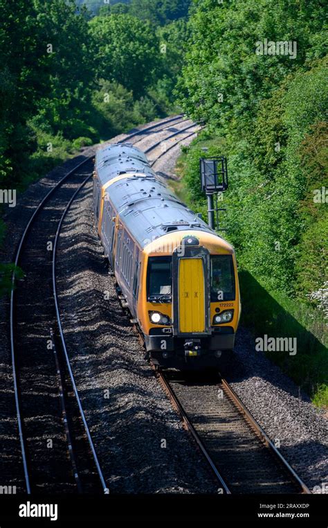 West Midlands Trains Class 172 Travelling Along Track In Warwickshire