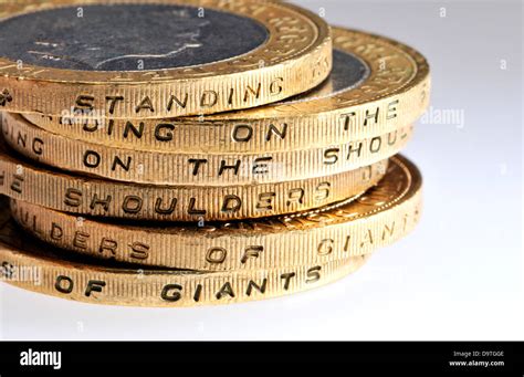 British £2 Coin Writing Around The Edge Standing On The Shoulder