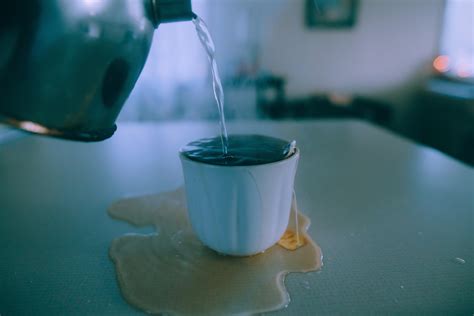 Overflowing Cup Of Tea