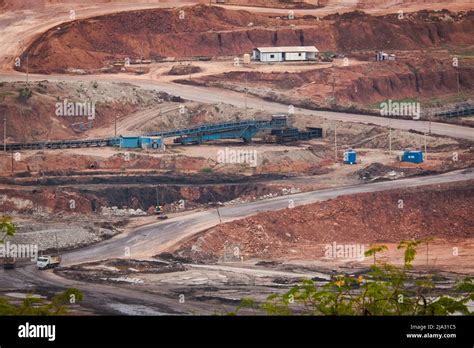 View Of Trucks And Excavators Work In Open Pits In Lignite Coal Mines