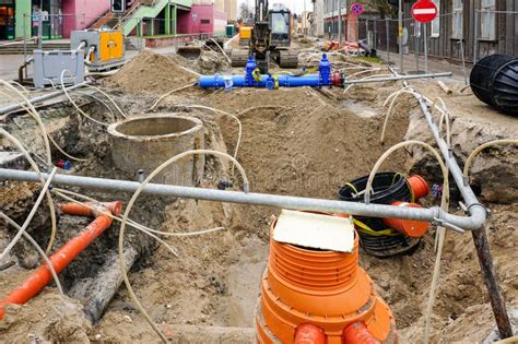 Underground Pipe Replacement On City Street Site Dewatering System New Pipeline With Gate