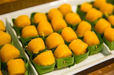 Premium Photo Assorted Thai Dessert Thong Yip In Banana Leaf In