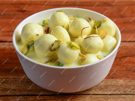 Premium Photo Angoori Rasmalai Is An Indian Dessert Sweet With Dry