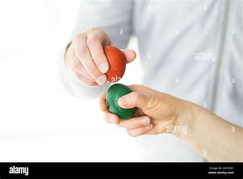 Easter Egg Tapping Close Up Of Two Hands Egg Tapping Mother And Son