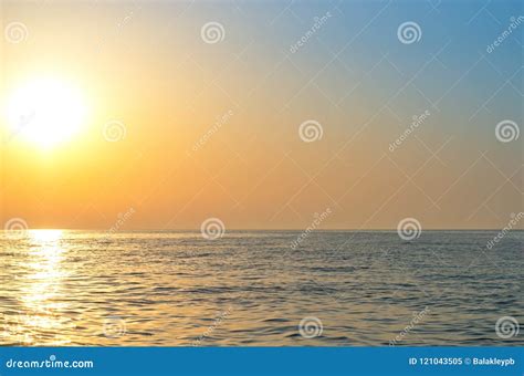 Sunrise Over The Sea Horizon Reflections On The Water Stock Image