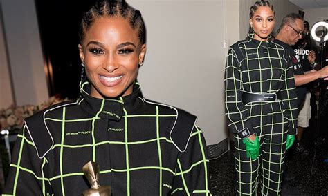 Ciara Dons Racing Overalls And Green Gloves As She Receives Harlem