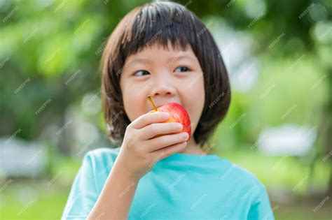 Humans Eating An Apple
