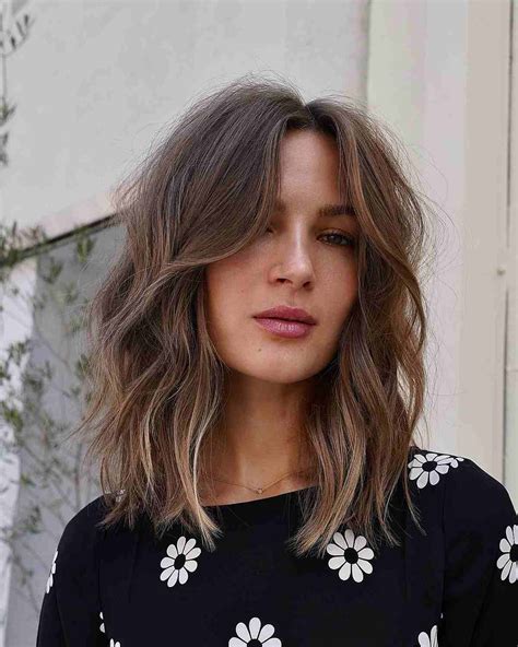 26 Best Ways To Get Curtain Bangs For Curly Hair Right Now Hair