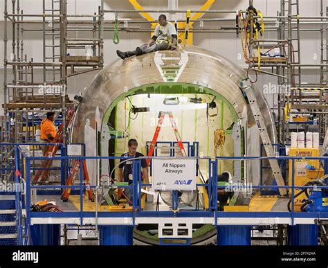 Boeing Employees Work On An Aft Fuselage For The 787 Dreamliner Inside