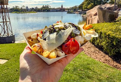 Where To Get The Most Colorful Poutine At The 2025 Epcot Festival Of The Arts