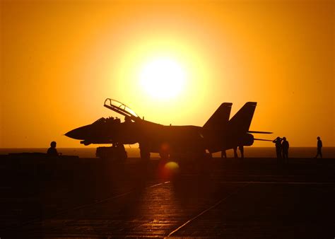 Dvids Images The Setting Sun Silhouettes An F 14d Tomcat After A
