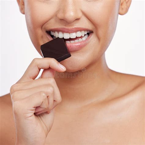 Chocolate Bite And Mouth Of Woman In Studio Eating Luxury Food Sweet