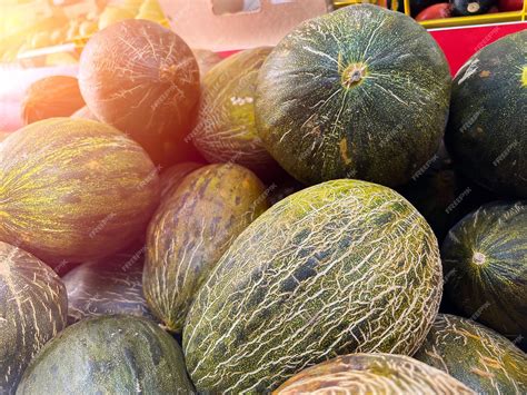 Premium Photo Melon Piel De Sapo In The Fruit Shop Close Up