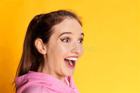 Happy Extremely Excited Portrait Of Young Beautiful Girl Posing In