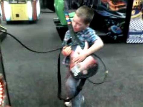 Matthew Playing Guitar Hero 2 At Chuck E Cheeses Youtube