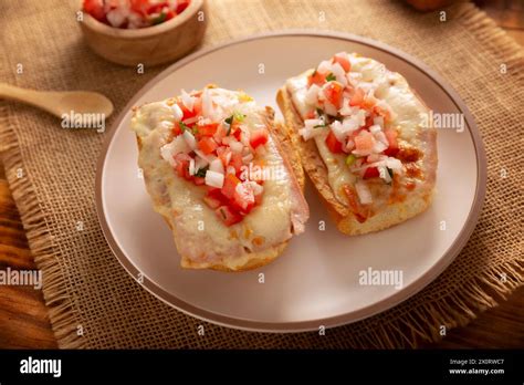 Molletes Mexican Recipe Based On Bolillo Bread Split Lengthwise