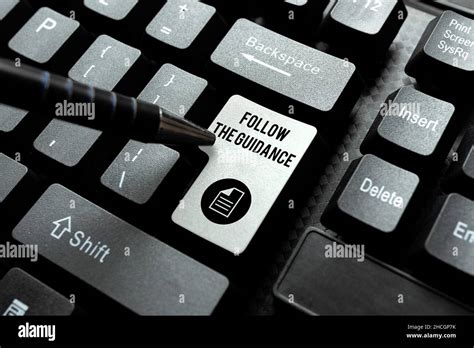 Hand Writing Sign Follow The Guidance Word Written On Controlling A