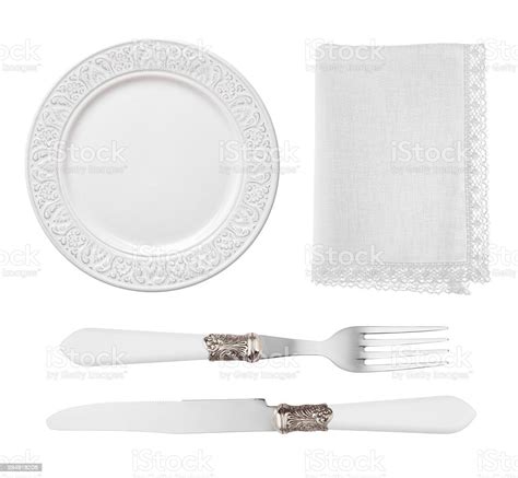 Vintage Plate Knife Fork And Napkin Isolated On White Background Stock