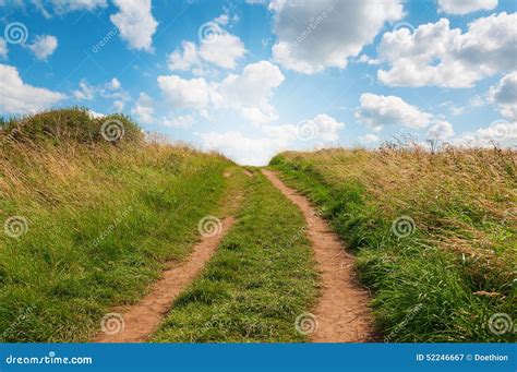 Grassy Path Facing Uphill With Blue Sky Stock Image Image Of