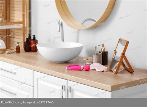 Sex Toys With Sleeping Mask Mirror And Bath Accessories On Counters In