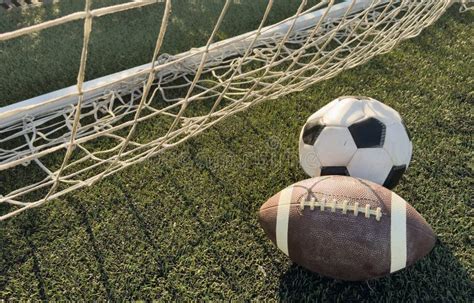 Soccer Ball On A Grass Football Field High Quality Photo Stock Image