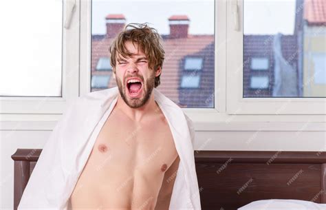 Premium Photo Picture Showing Young Man Stretching In Bed Handsome