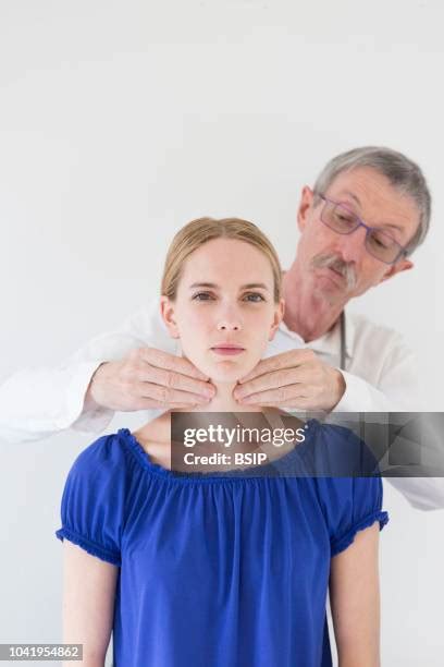 Doctor Checking Thyroid Photos And Premium High Res Pictures Getty Images