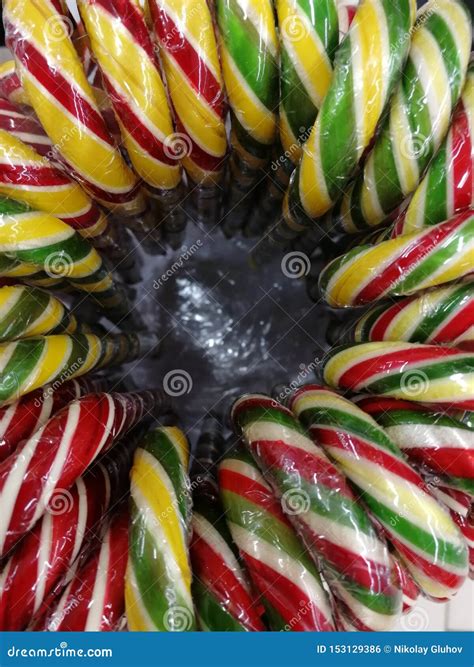 Multi Colored Cane Mint Candy In The Form Of A Cane In A Round Box