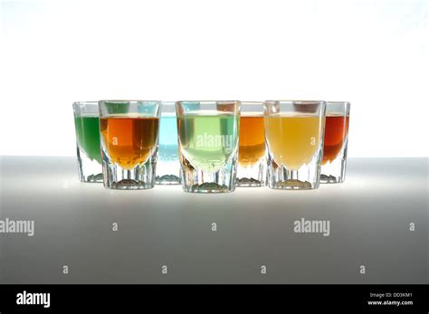 Small Barware Glasses Filled With Colorful Liquids Also Known As Shot