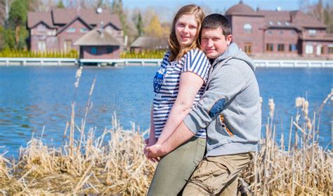 Young Chubby Couple Of Girl Ang Man At Nature Stock Image Image Of