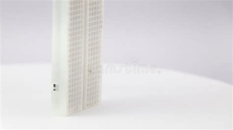 View Of A Solderless Breadboard With Its Back Connections From Rotating