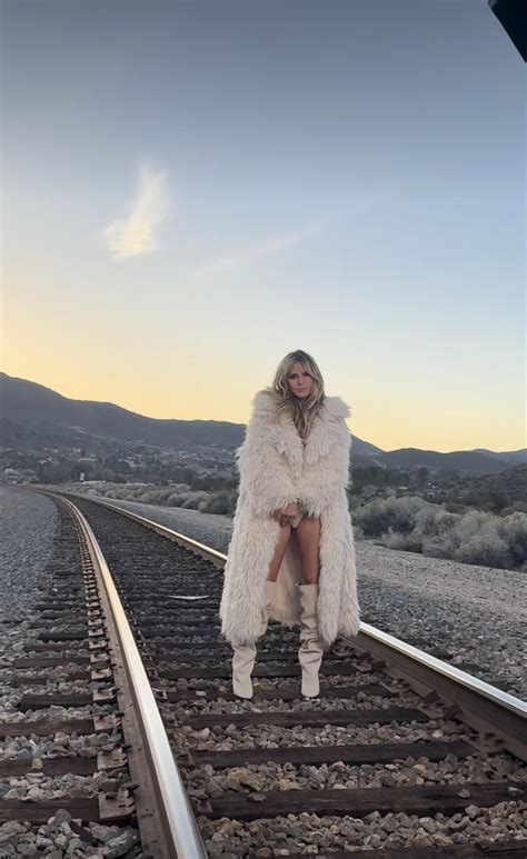 Heidi Klum Dares To Bare In Thong Fuzzy Coat And Boots