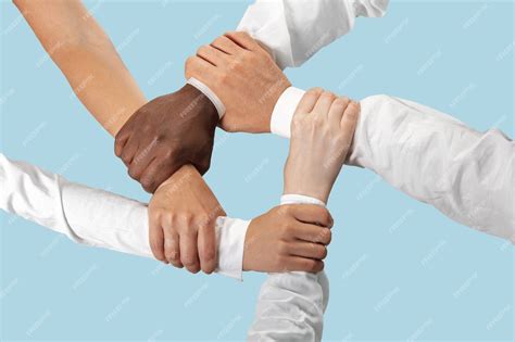 Free Photo Male And Female Hands Holding Isolated On Blue