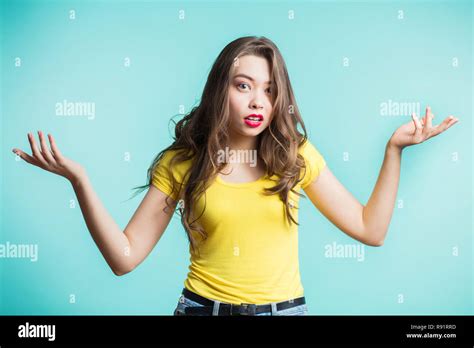 Worried Helpless Woman Spread Hands And Doesnt Know What To Do