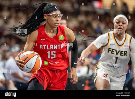 Atlanta Dream Guard Allisha Gray Left Drives The Ball During The