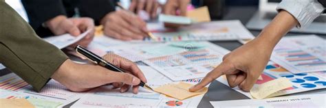 Analyst Team Use Sticky Note For Financial Analyzing Prodigy Stock