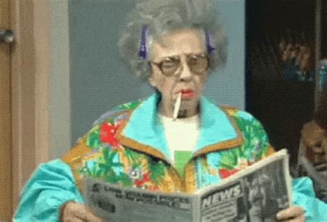 Old Lady Slowly Standing 