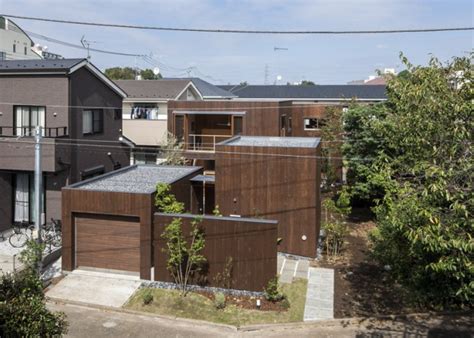 Timber Volumes Create Courtyards At Architect Cafes House In Komae