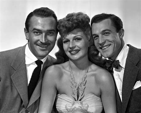 Smiling Portrait Of Rita Hayworth Gene Kelly And Lee Bowman Photograph