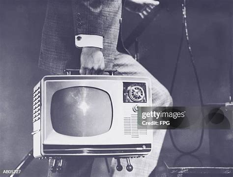 Man Carry Tv Photos And Premium High Res Pictures Getty Images