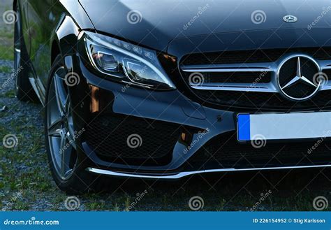 Black Mercedes Benz Amg Sport C Class 220d Car Closeup Front View Of An Emblem Editorial