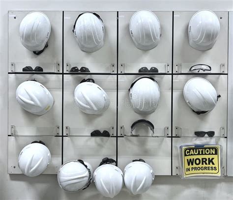 Board For Work Safety Helmets Or Hard Hats And Safety Glasses For Labor Protection Stock Image