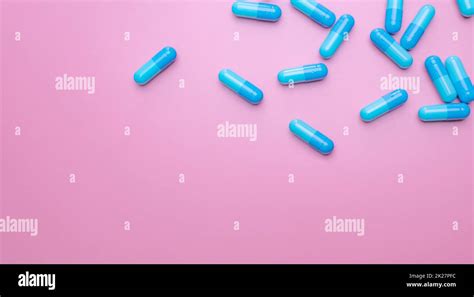 Top View Capsule Pills On Pink Background Prescription Drugs Blue