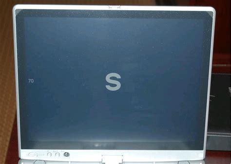 White Illuminated 2070 Snellen Optotype On A Black Background Used To