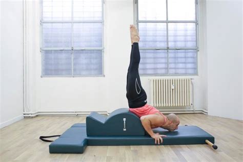 Emanuele Specchio Performing The Grasshopper On His Spine Corrector
