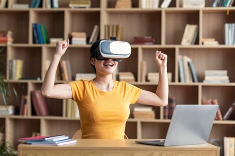 Premium Photo Cheerful Amazed Teen Chinese Female In Vr Glasses