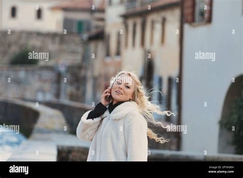 Young Woman With Long Curly Perfectly Permed Blonde Hair Perfect