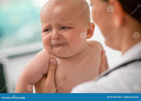 Scared Neonate Looking Away During A Medical Exam Stock Image Image