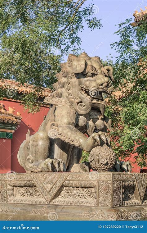 Guardian Lion In Front Of An Ornamented Pavilion At Yonghe Lamasery Also Known As Lama Temple