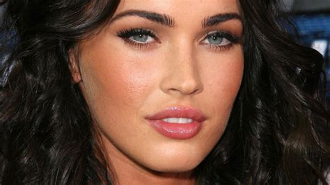 Megan Fox Seemingly Burns Engagement With Machine Gun Kelly To The Ground